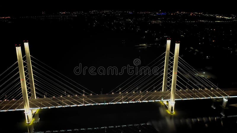 A Cable-stayed Highway Bridge with Tall Concrete Pylons Illuminated by ...