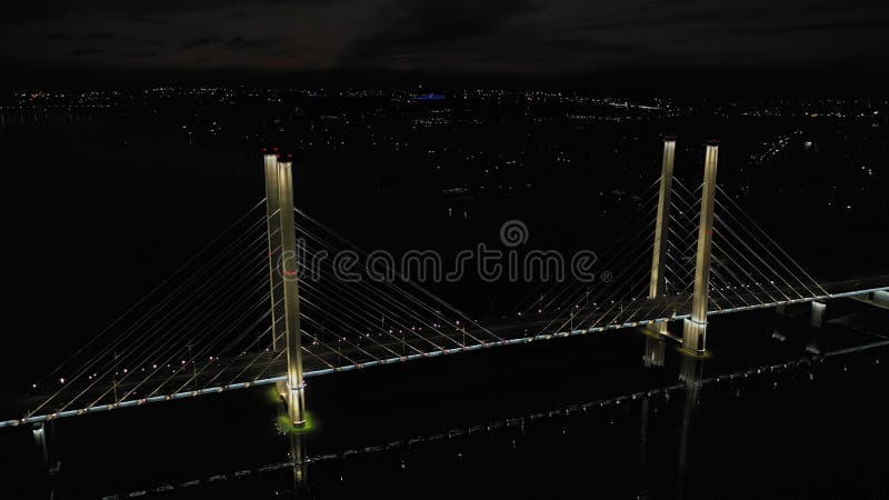 A Cable-stayed Highway Bridge with Tall Concrete Pylons Illuminated by ...