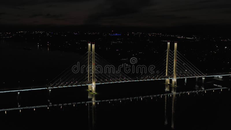 A Cable-stayed Highway Bridge with Tall Concrete Pylons Illuminated by ...
