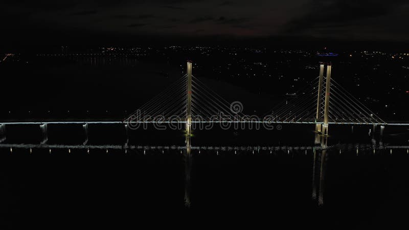 A Cable-stayed Highway Bridge with Tall Concrete Pylons Illuminated by ...