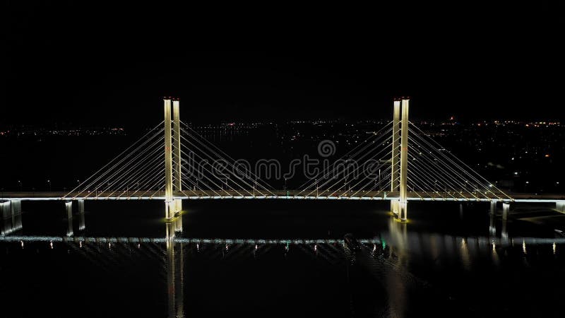 A Cable-stayed Highway Bridge with Tall Concrete Pylons Illuminated by ...