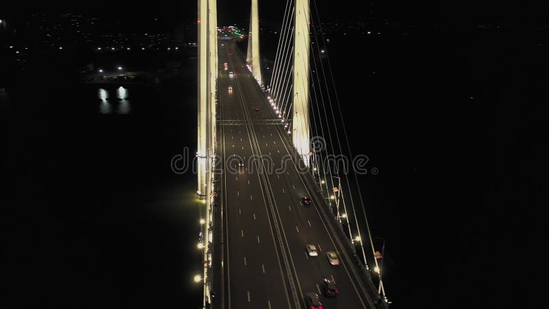 A Cable-stayed Highway Bridge with Tall Concrete Pylons Illuminated by ...