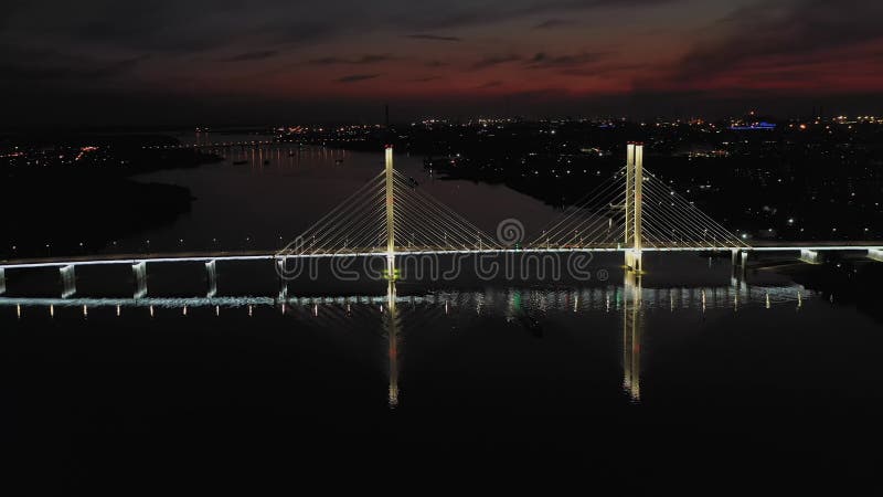 A Cable-stayed Highway Bridge with Tall Concrete Pylons Illuminated by ...