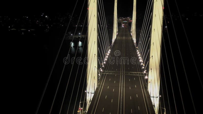 A Cable-stayed Highway Bridge with Tall Concrete Pylons Illuminated by ...