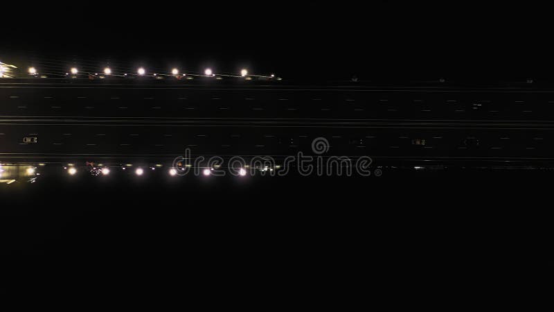 A Cable-stayed Highway Bridge with Tall Concrete Pylons Illuminated by ...