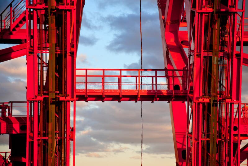 Cable-stayed red bridge. stock image. Image of metal - 48807803