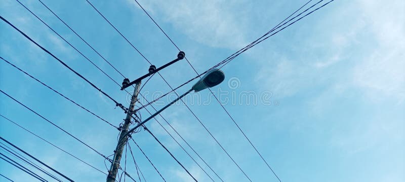 Cable Strings Around Power Poles Under Blue Sky Stock Image - Image of ...