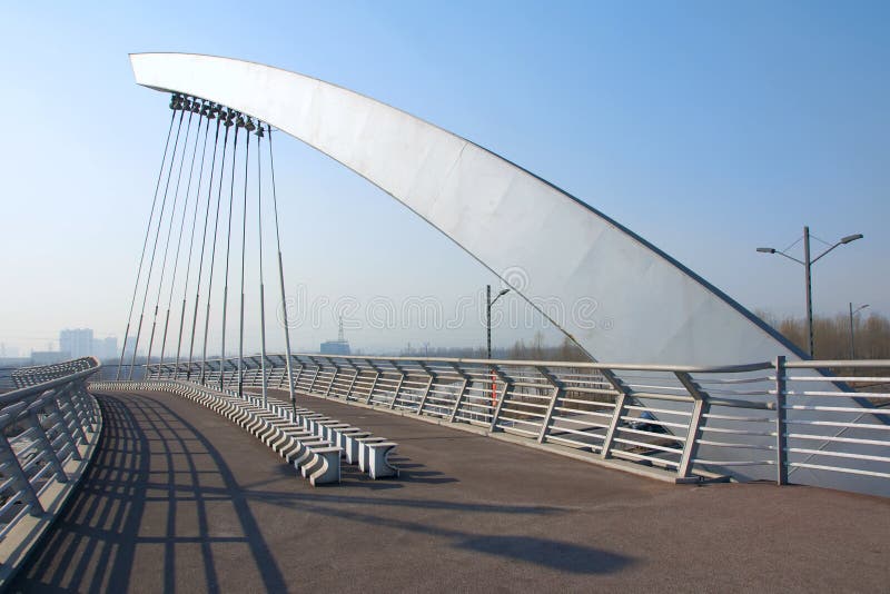 Cable suspension bridge stock photo. Image of buildings - 28859434