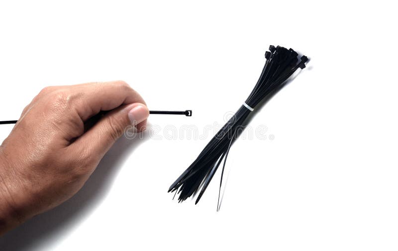 The Cable Tie in Hand and Bundle of Black Cable Tie Stock Photo - Image ...