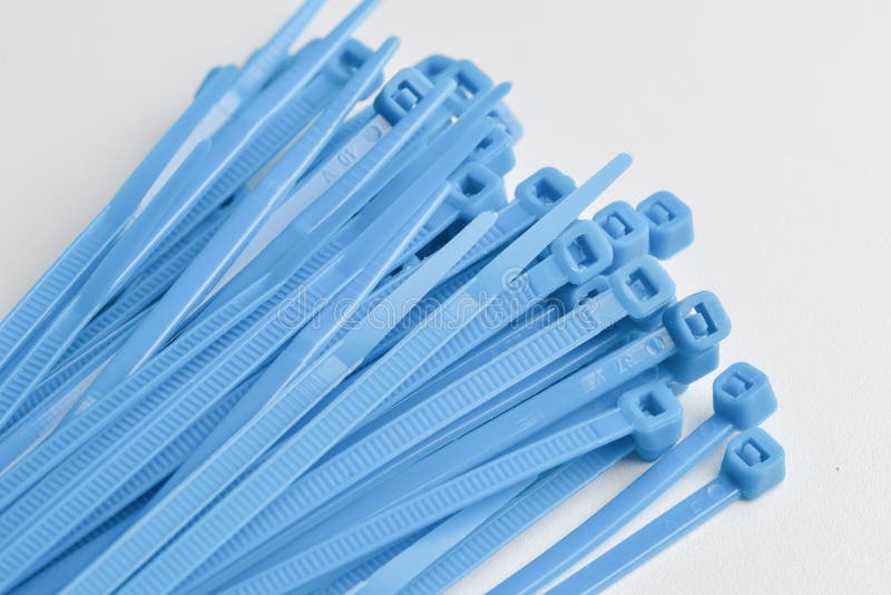 Cable ties on white table stock photo. Image of harness - 95174594