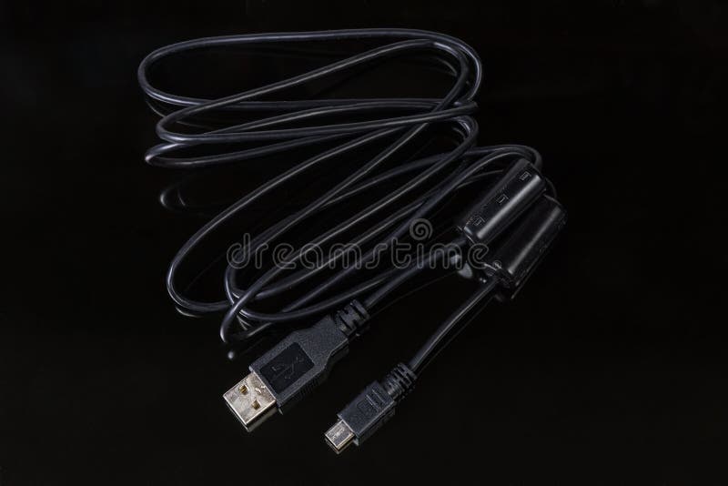 Cable USB To Mini-USB on a Dark Reflective Surface Stock Photo - Image ...