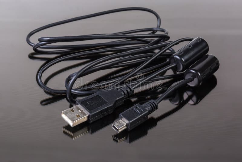 Cable USB To Mini-USB on a Dark Reflective Surface Stock Image - Image ...