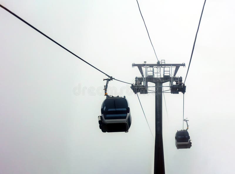 The Cable-way Cab Moves in the Fog Stock Photo - Image of forest ...
