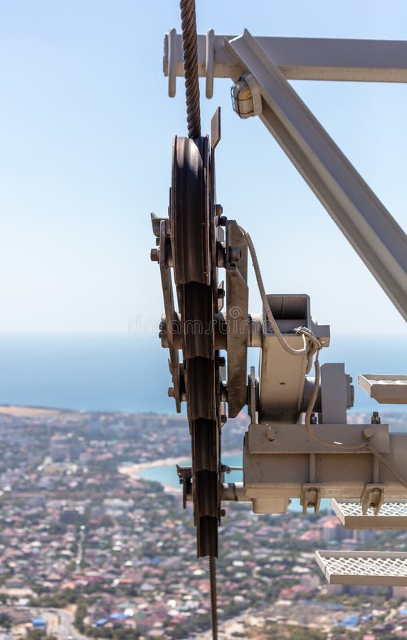 Cable on Wheels on a Mountain Lift Stock Photo - Image of tension ...