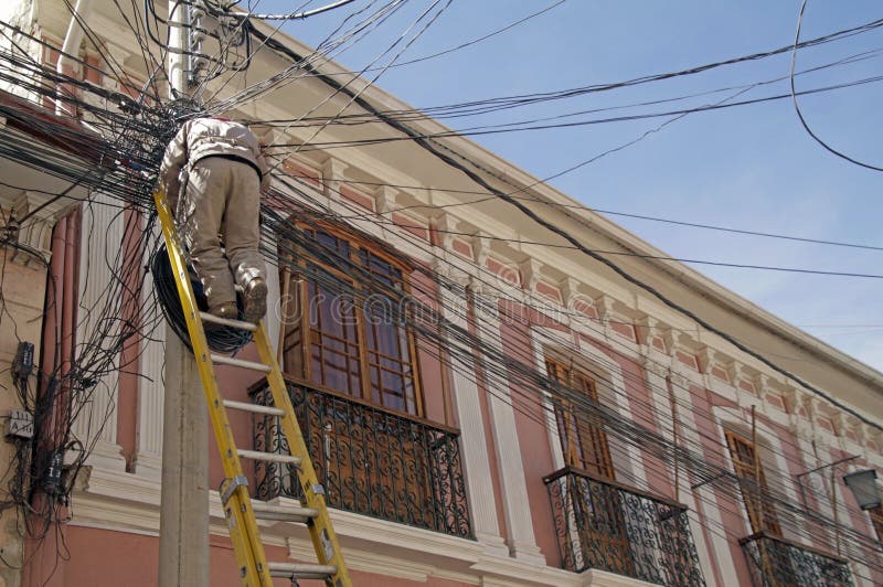 Cable Worker Coming Down the Ladder Stock Photo - Image of power ...