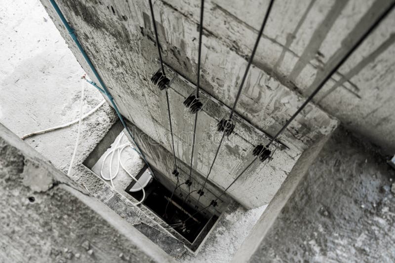 Cables in an Elevator Shaft at a New Building Construction Site Stock ...