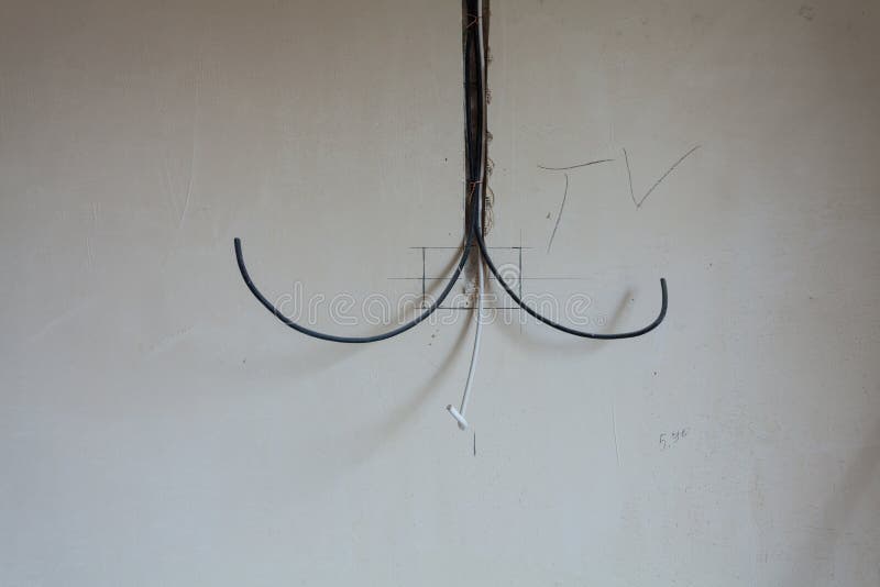 Cables for TV, Computer and Other Home Equipment in Concrete Wall of ...