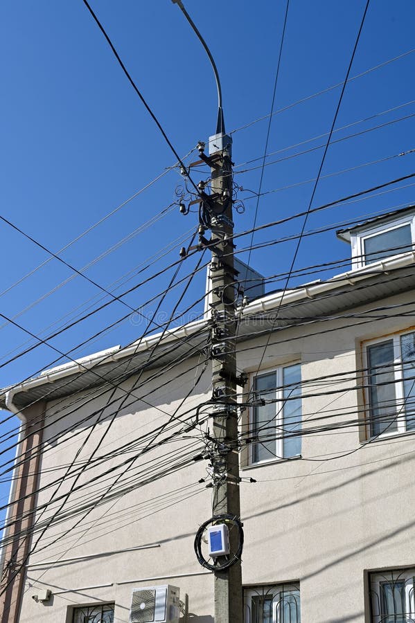 Many Cables and Wires on an Electric Pole. Vertical Stock Photo - Image ...