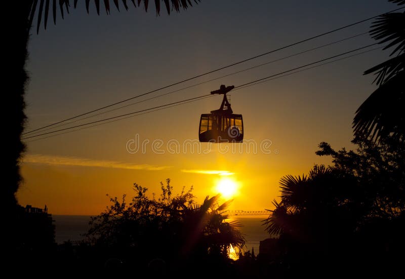 Cableway, sunset, stock photo. Image of coast, palm, cabin - 93349908