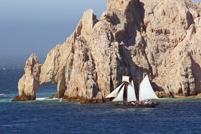 Cabo Rocks and Sailboat stock image. Image of rocks, coast - 763331
