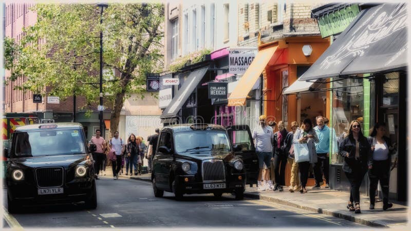 Cabs on Old Compton Street in Soho, London Editorial Photography ...