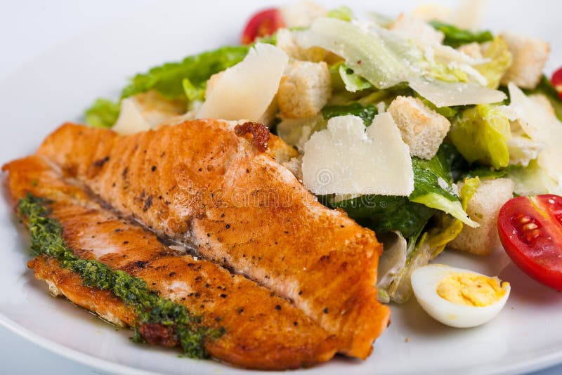Caesar salad with fish stock photo. Image of closeup - 184869960