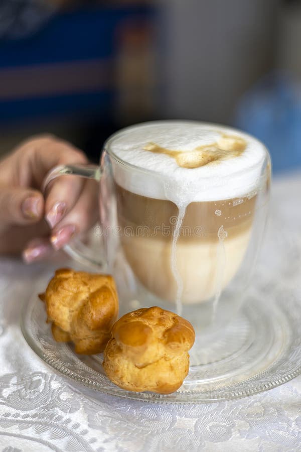 Caf Latte with Chocolate Chips and Eclairs. Stock Photo - Image of arabica, brewed: 339106910