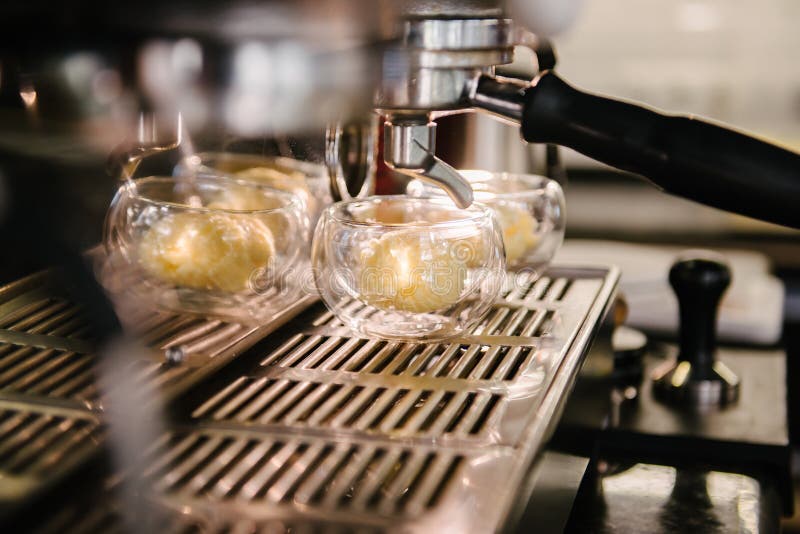 Cafe. a Coffee Machine that Has a Glass Cup with a Scoop of Ice Cream ...