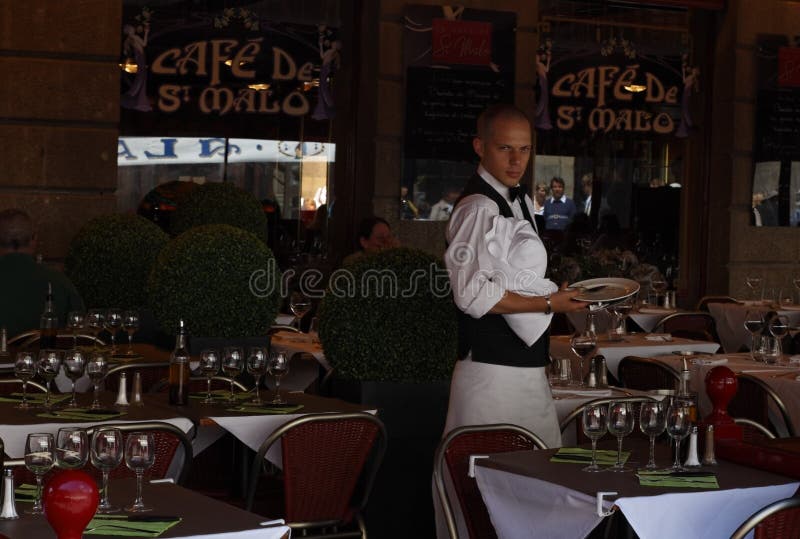 Greek waiter with lobster stock photo. Image of waiter - 5353172