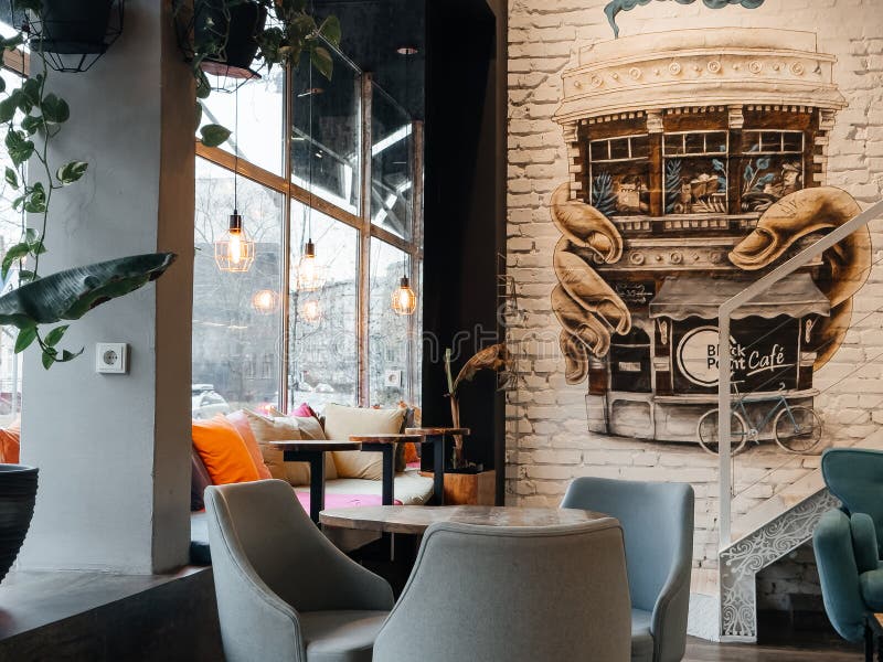 Cafe Interior with Large Windows and a Second Floor Stock Photo - Image ...
