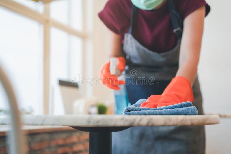 Owner Cleaning Table before Open in Covid 19 Situation Stock Photo ...