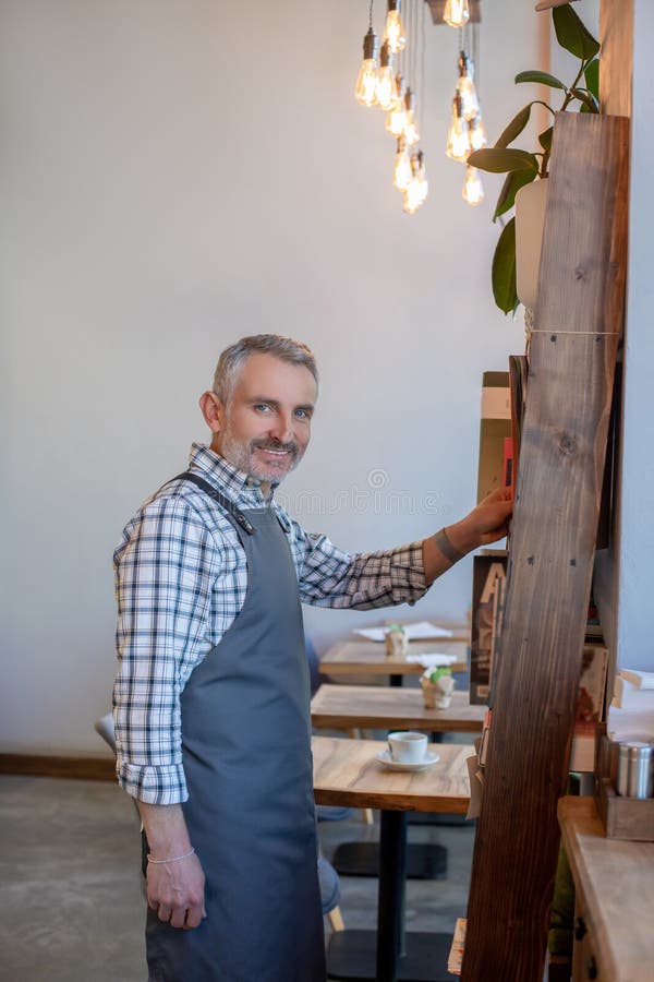 Cafe Owner in a Cafe Standing Near the Tables Stock Image - Image of ...
