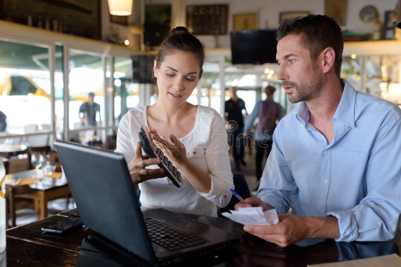 Cafe Owners Working through Their Accounts Stock Image - Image of ...