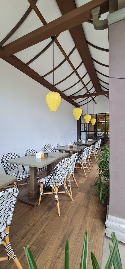 A Cafe with Sets of Chairs and Dining Table Stock Image - Image of wood ...
