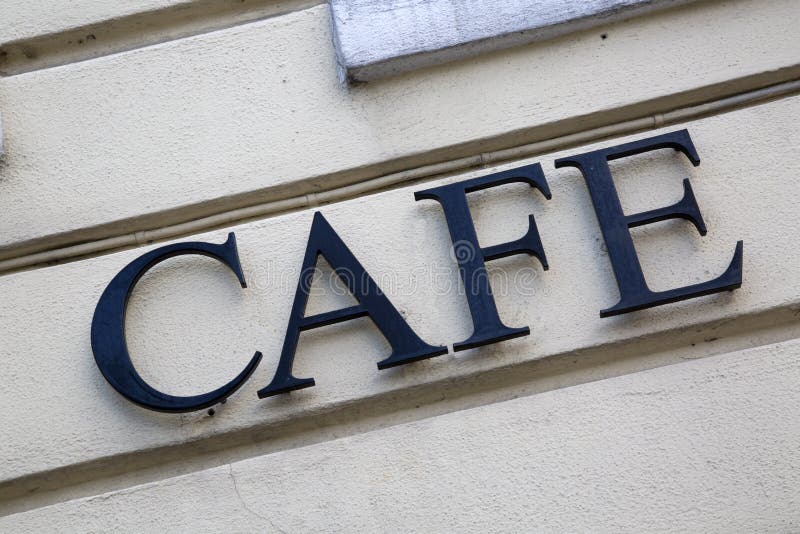 Cafe Sign on Building stock image. Image of drink, tilt - 191564051