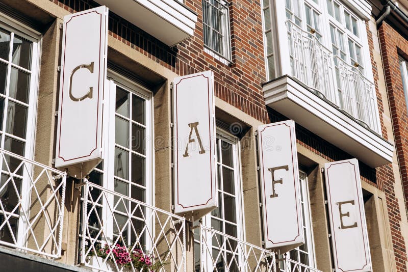 Cafe Sign on the Outside of the Building Stock Photo - Image of coffee ...
