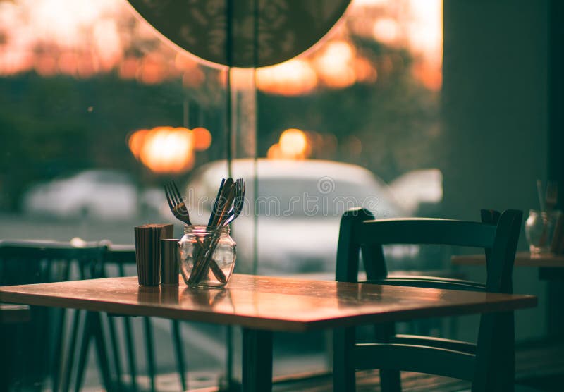 Cafe sunset stock photo. Image of sunset, cafe, table - 160426546