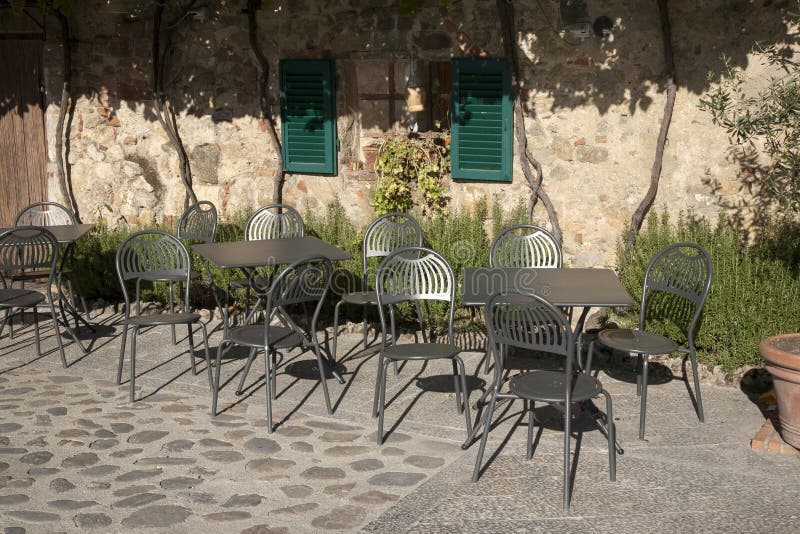 Cafe Table and Chairs; Tuscany Stock Image - Image of food, wall: 88037697