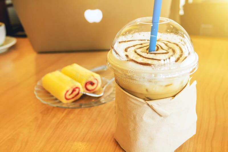 A Cafe Table with Coffee and Jam Roll. Stock Photo - Image of cafe ...