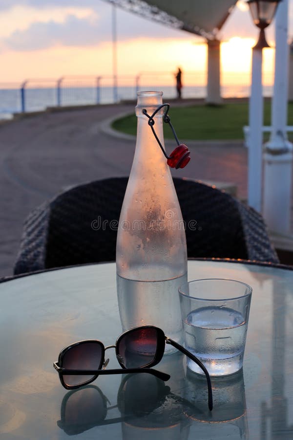 In a Cafe on the Table is a Glass of Water Stock Image - Image of water ...