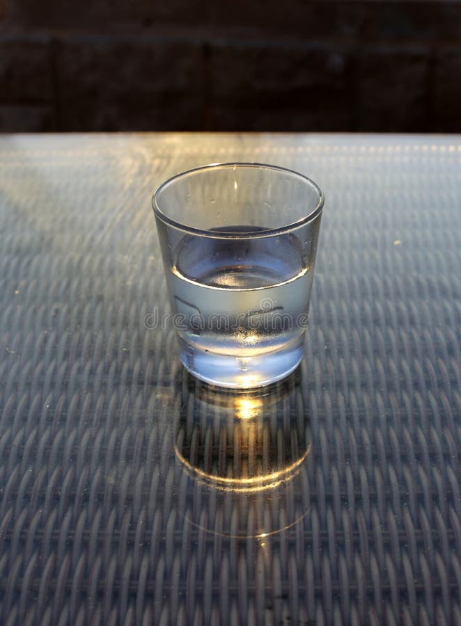 In a Cafe on the Table is a Glass of Water Stock Photo - Image of ...