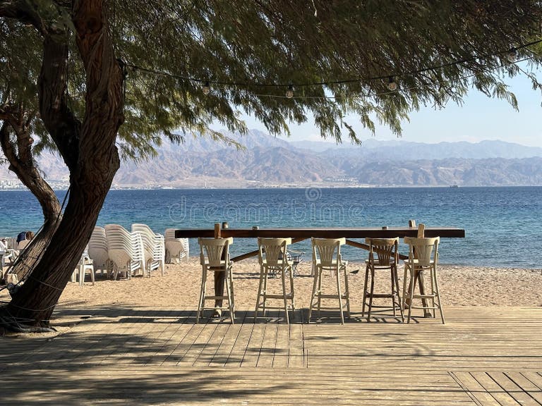 Cafe Tables on Dekel Beach in Eilat Stock Photo - Image of coast, chair ...