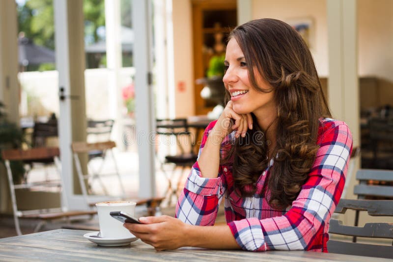 Cafe Woman Holding Phone stock image. Image of outdoor - 90977643