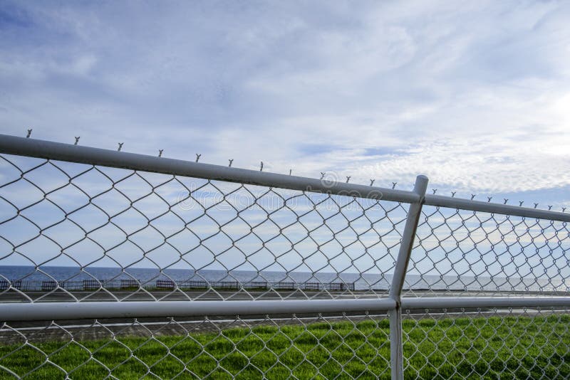 Cage Fence in Fields, Blue Sky Background Stock Photo - Image of chain ...