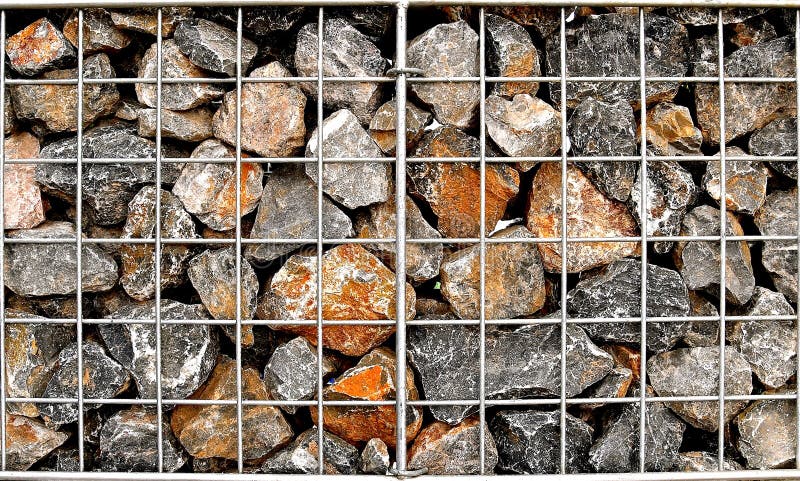 A cage of rocks stock image. Image of architecture, bricks - 152520745