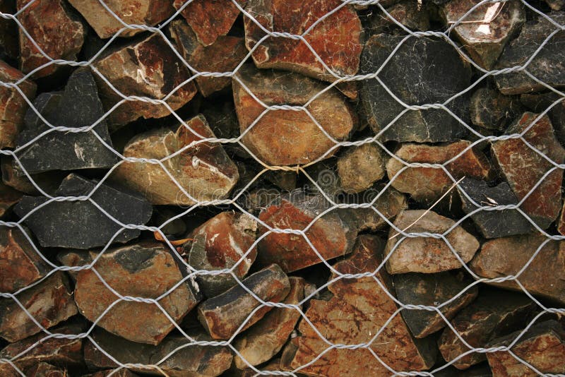 Caged Stones stock photo. Image of wire, pattern, order - 48088912