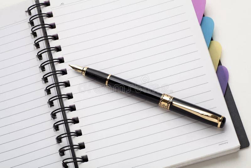 Cahier avec le stylo-plume photo stock. Image du affaires - 25896248