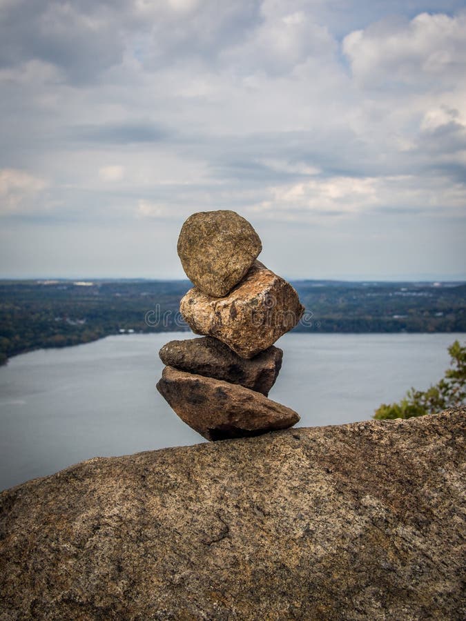 Cairn on a Cliff Over River Stock Photo - Image of landscape, cliff ...