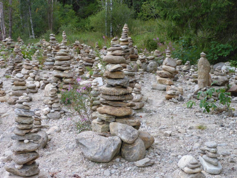 A Cairn Human-made Pile or Stack of Stones Near Hallstatt Lake at Sunny ...