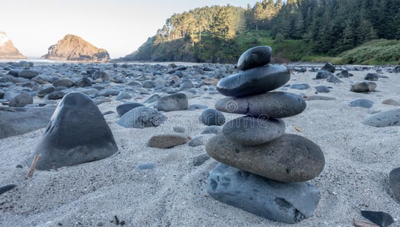 Cairn of Smooth Beach Rocks Stock Photo - Image of summer, pebble ...